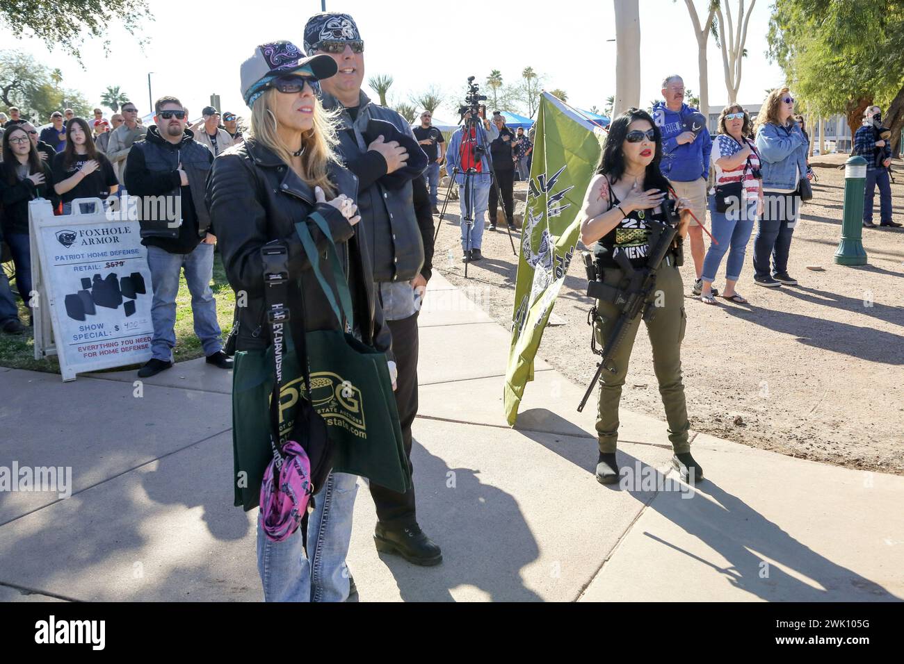 People listen in reverence during the Pledge of Allegiance at Arizona's 11th Annual Celebrate ...