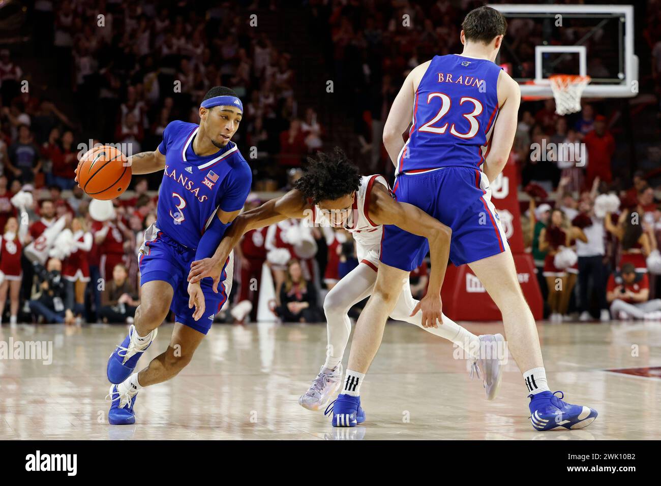 Kansas guard Dajuan Harris Jr. (3) drives the ball against Oklahoma ...
