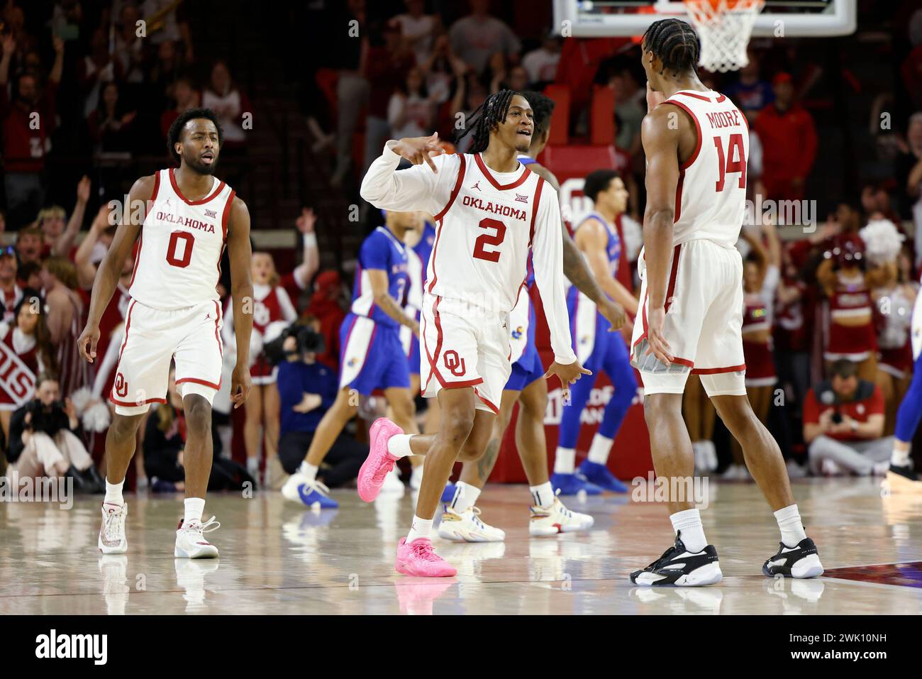 Oklahoma players Le'Tre Darthard (0), Javian McCollum (2) and Jalon Moore (14) react during the ...