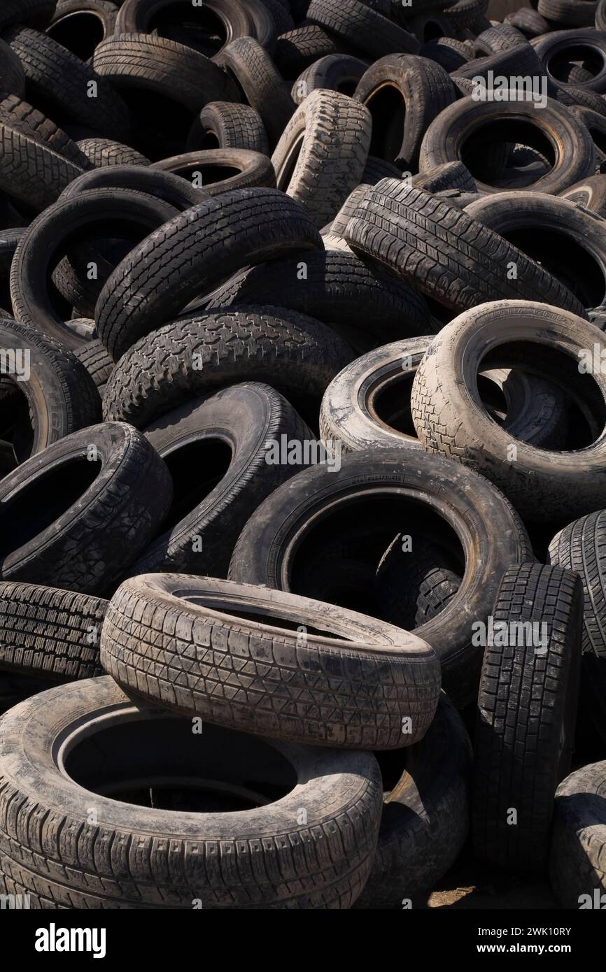 Pile of discarded car and truck tires at recycling yard Stock Photo - Alamy