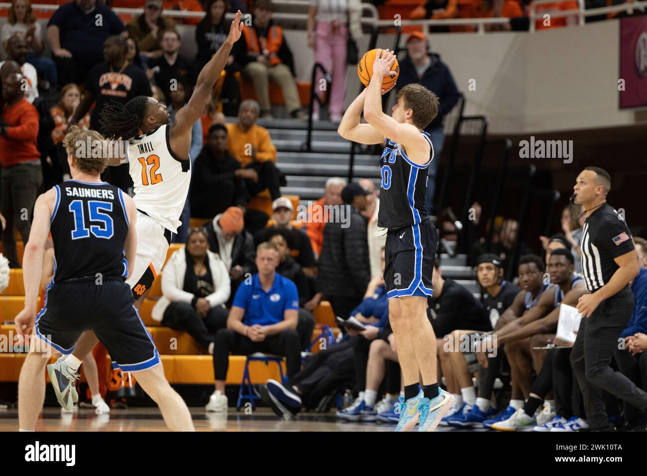 BYU guard Spencer Johnson (20) shoots over Oklahoma State guard Javon ...