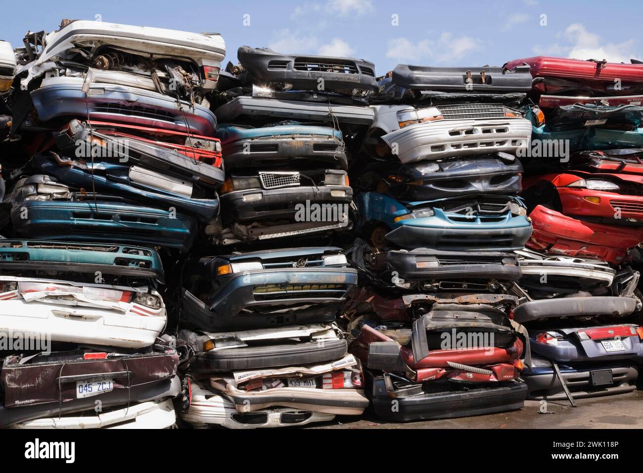 Pile of crushed and stacked automobiles at scrap metal recycling ...