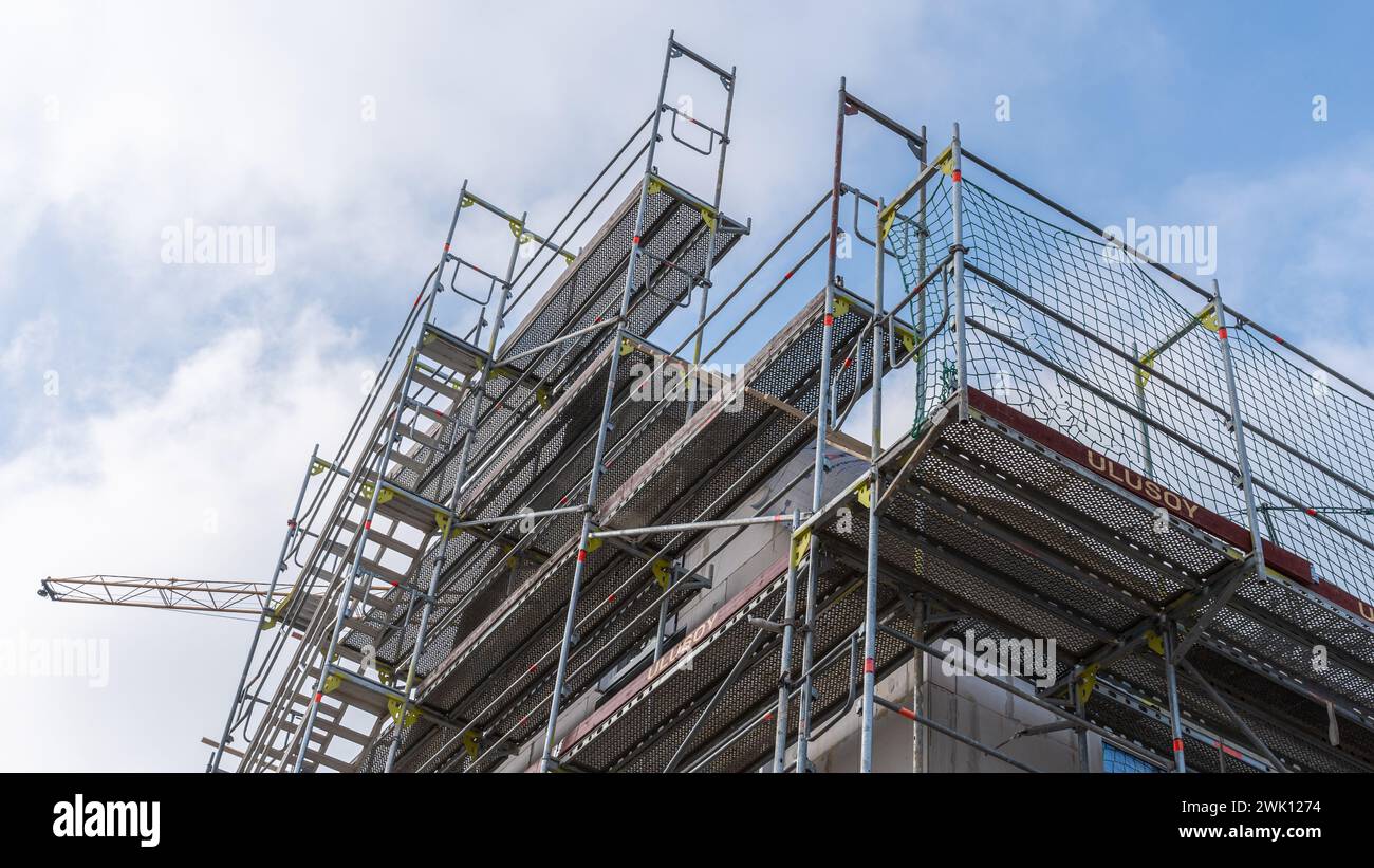 Scaffolding on a building with attached industrial scaffolding Stock ...