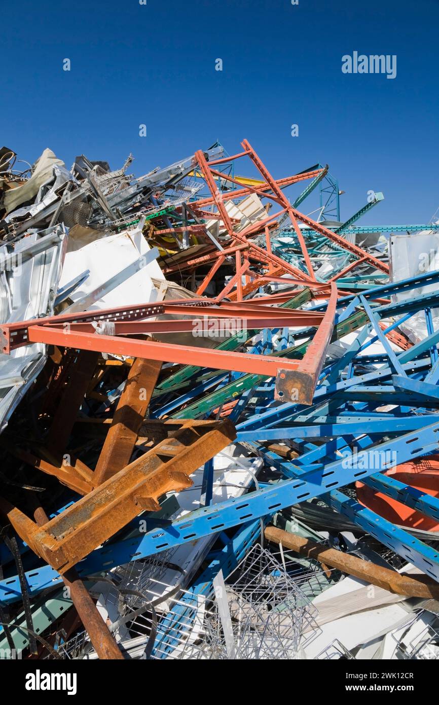 Pile of discarded steel racks and shelves at scrap metal recycling ...