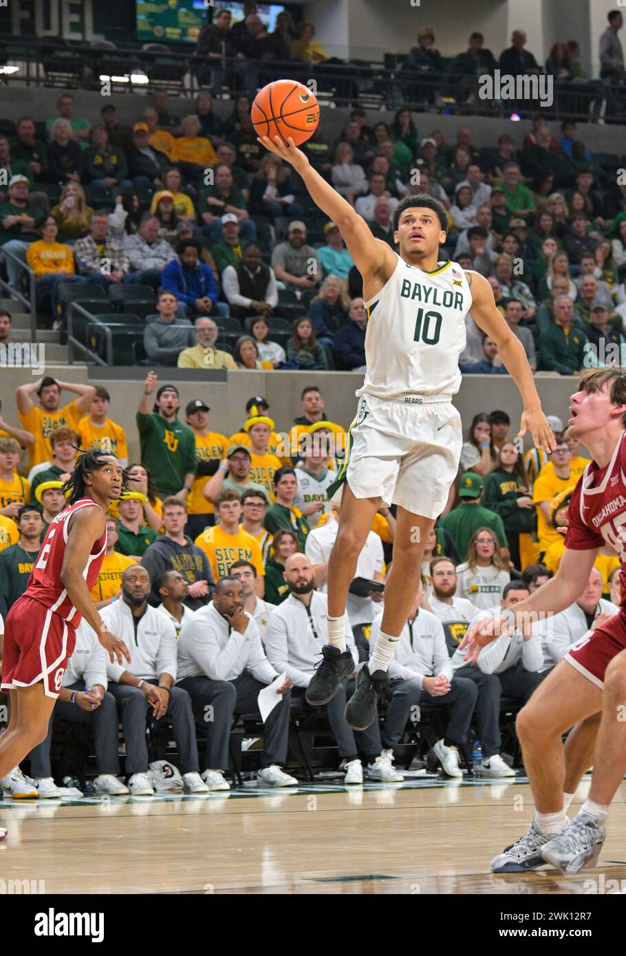 February 13 2024: Baylor Bears guard RayJ Dennis (10) shoots the ball ...