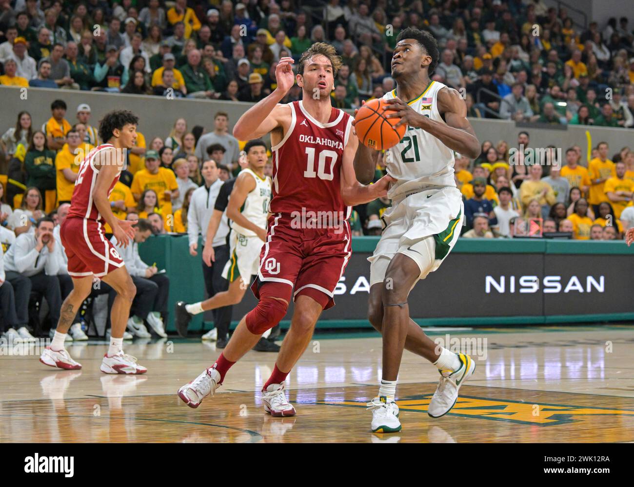 February 13 2024: Baylor Bears center Yves Missi (21) shoots the ball ...