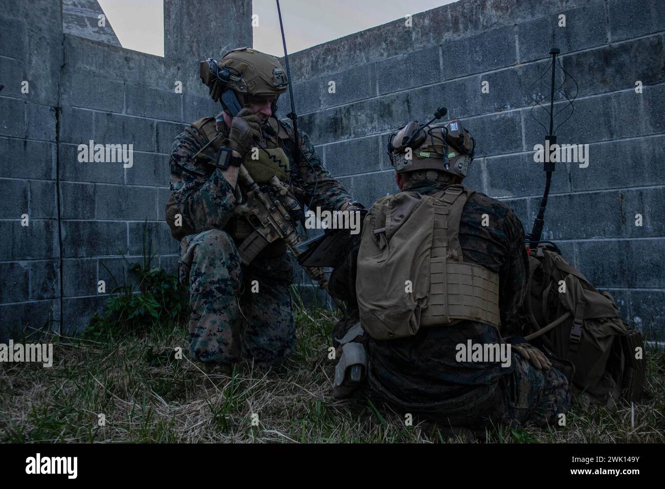 U.S. Marine Corps Capt. Sean Hunt, left, a company commander with ...