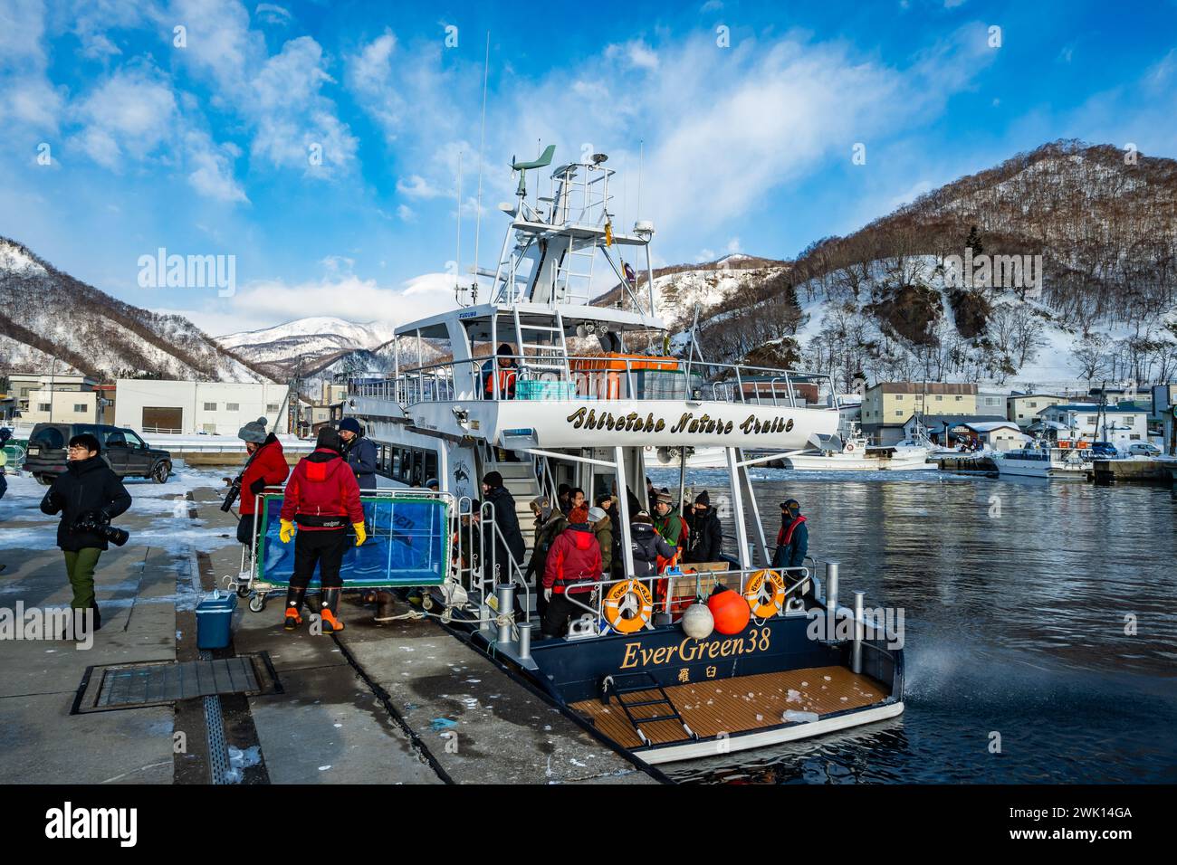Tour boats bringing tourists to enjoy the winter scenery. Rausu ...