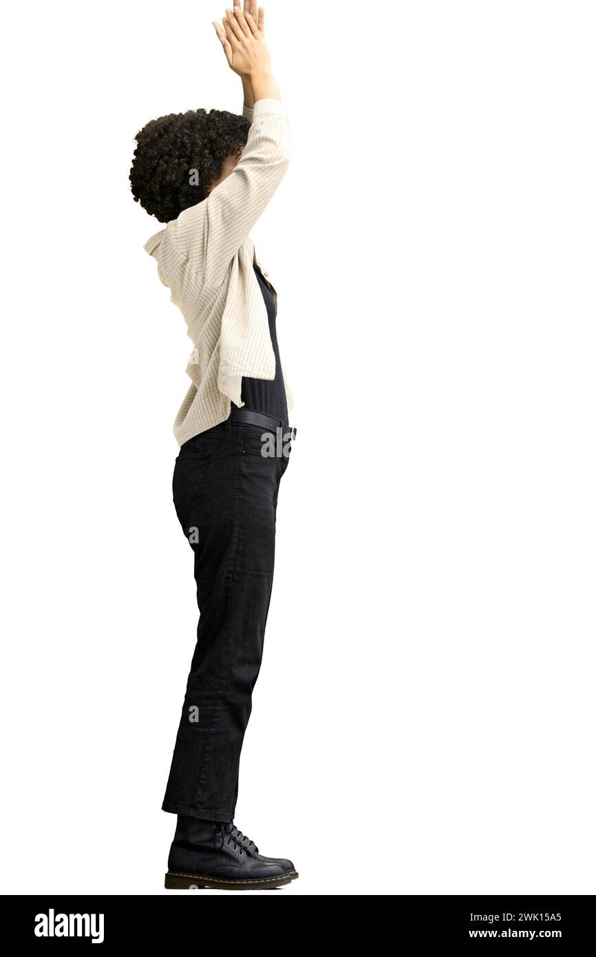 A woman, full-length, on a white background, claps Stock Photo - Alamy