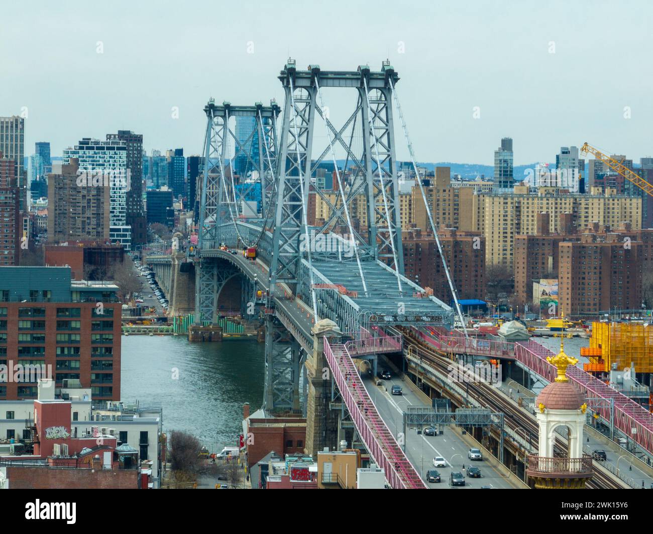 Aerial view of the the Williamsburg Bridge over the East River in ...