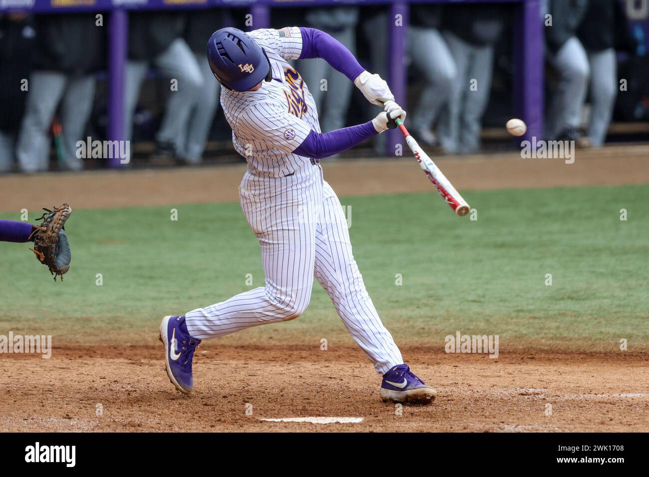 Baton Rouge, LA, USA. 17th Feb, 2024. LSU's Jared Jones (22) delivers a ...