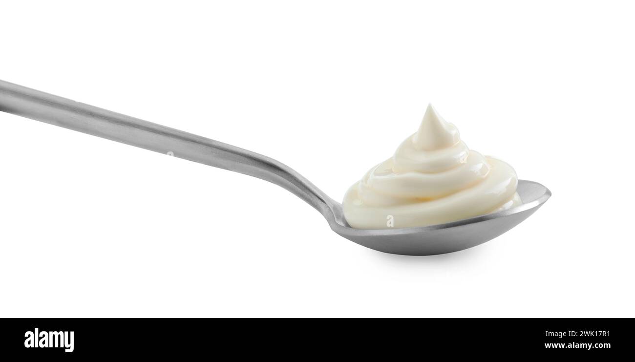 Silver spoon with mayonnaise isolated on white Stock Photo - Alamy