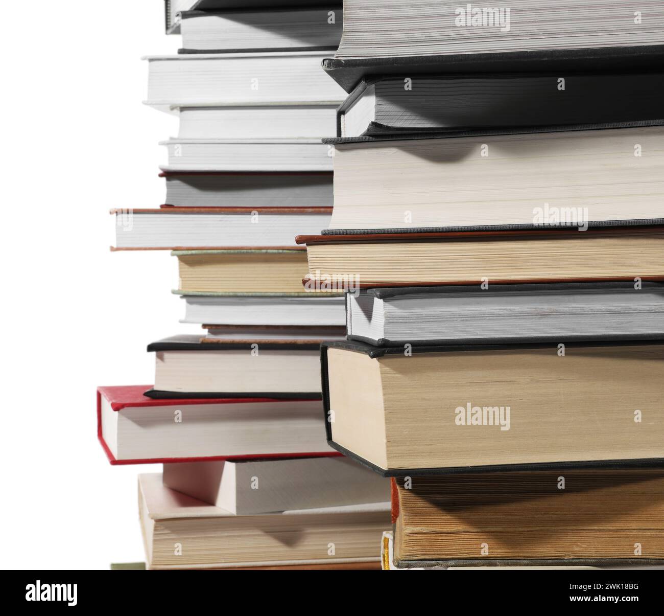 Stacks of many different books isolated on white Stock Photo - Alamy