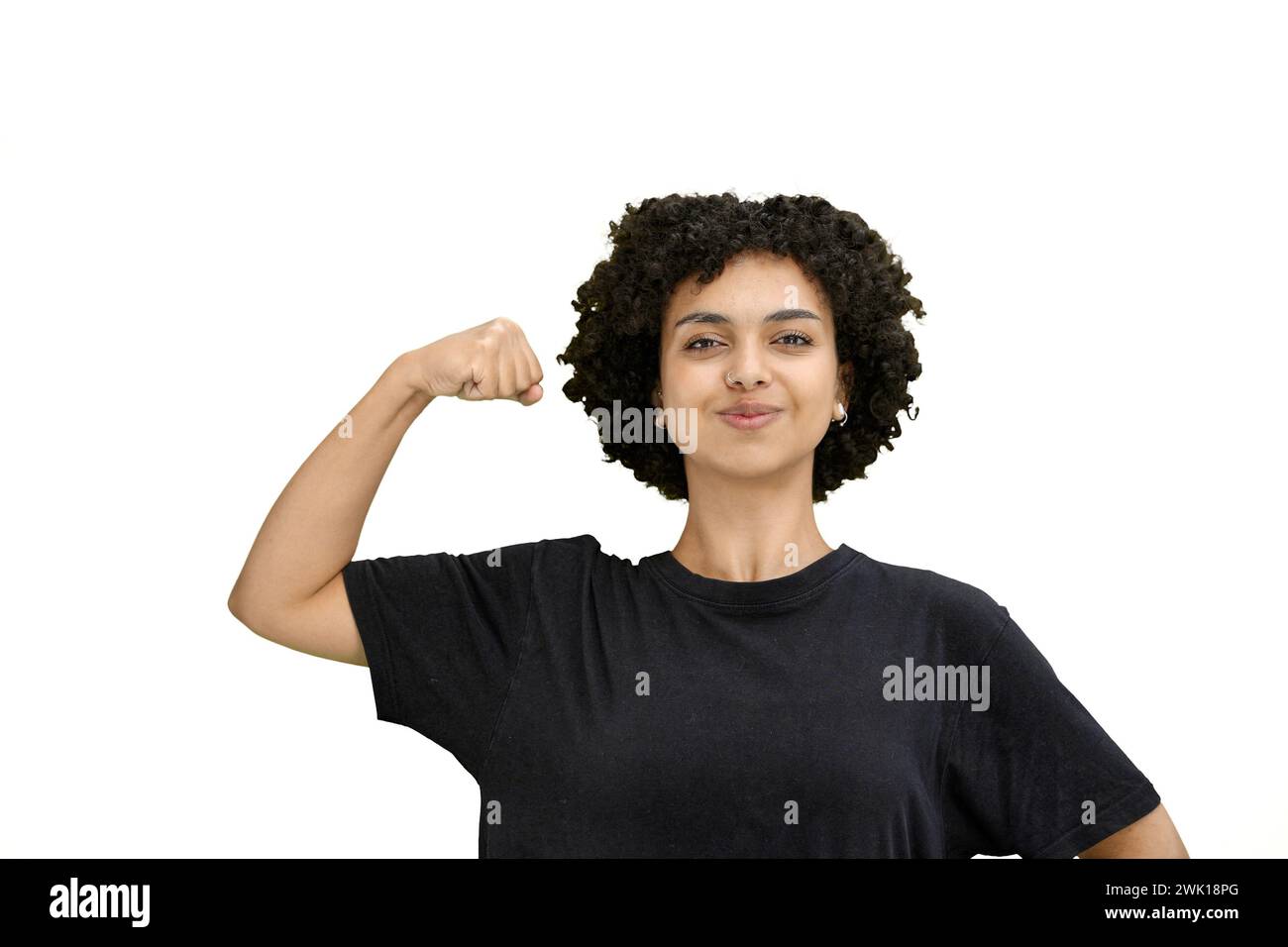 A woman, close-up, on a white background, shows strength Stock Photo ...