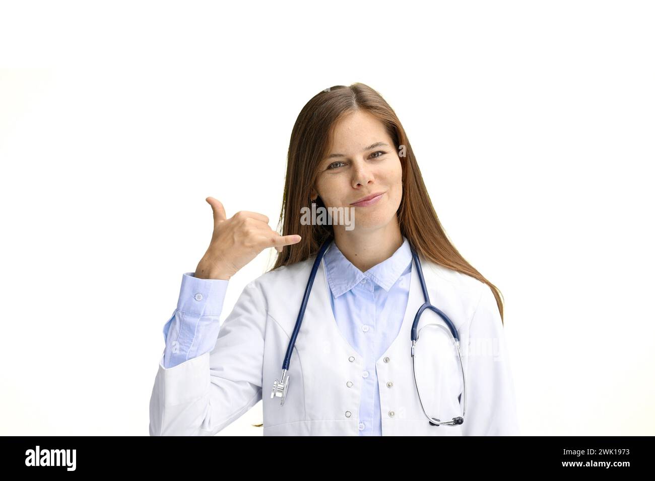 Female doctor, close-up, on a white background, shows a call sign Stock ...