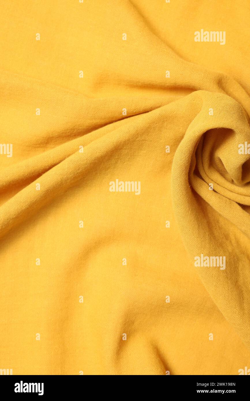 Texture of soft yellow crumpled fabric as background, top view Stock ...