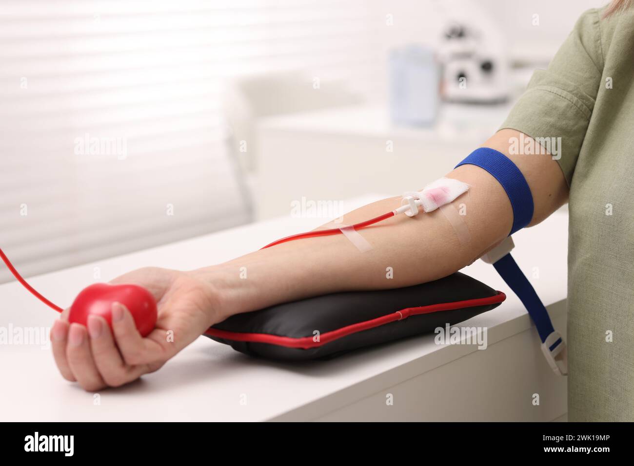 Patient undergoing blood transfusion in hospital, closeup Stock Photo ...