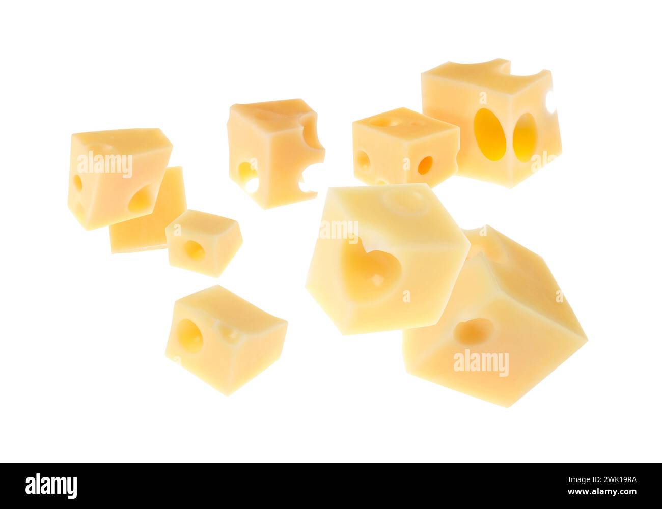 Pieces of cheese flying on white background Stock Photo - Alamy