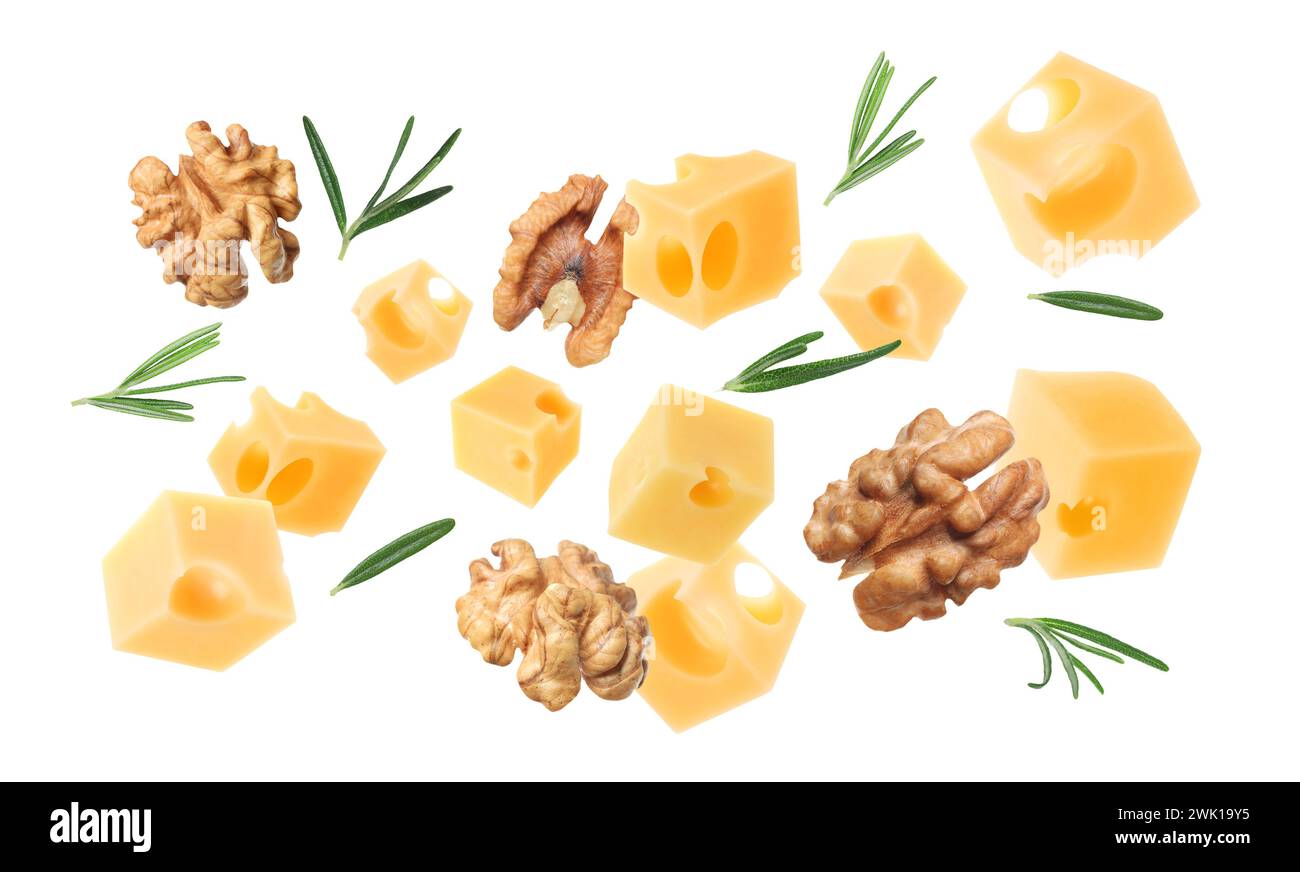 Cheese, walnuts and rosemary flying on white background Stock Photo - Alamy