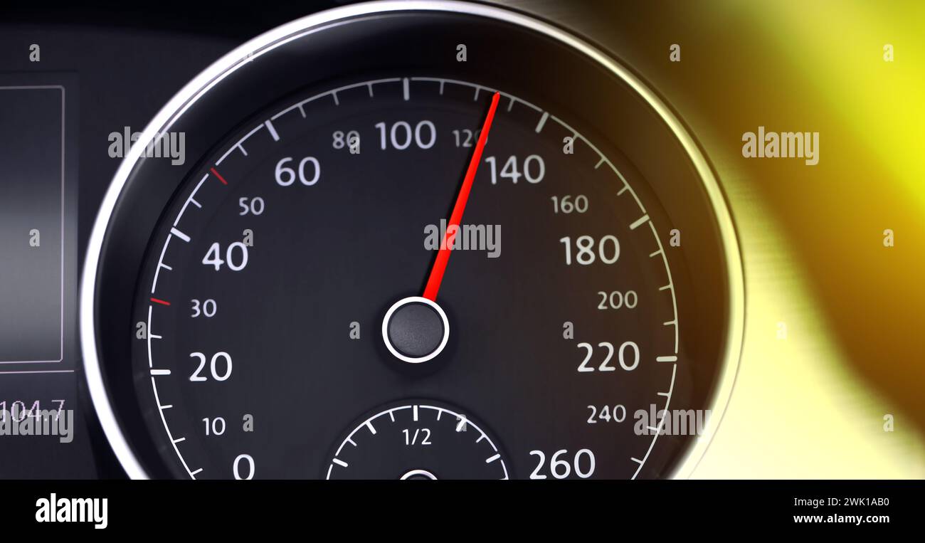 Speedometer on car dashboard under yellow light, closeup. Banner design ...