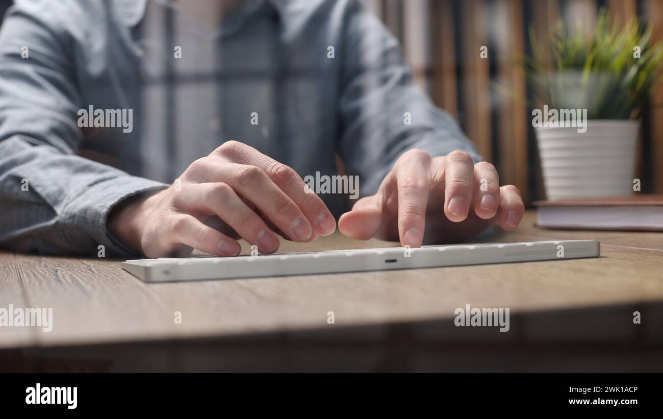 Typing on the keyboard at work in the office Stock Photo - Alamy