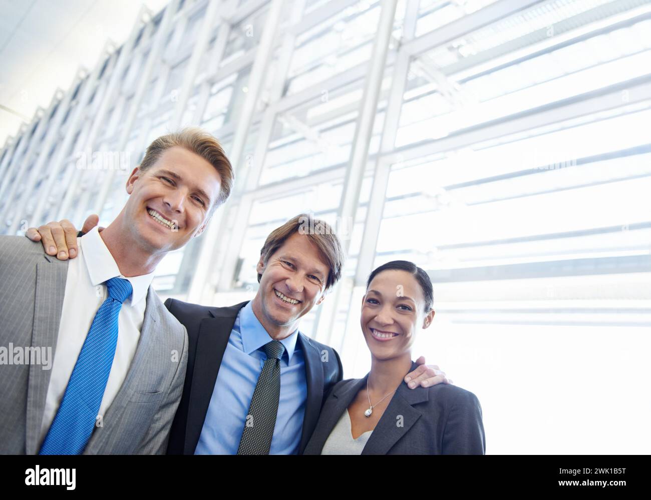 Business people, portrait and confident in cooperation, embrace and ...