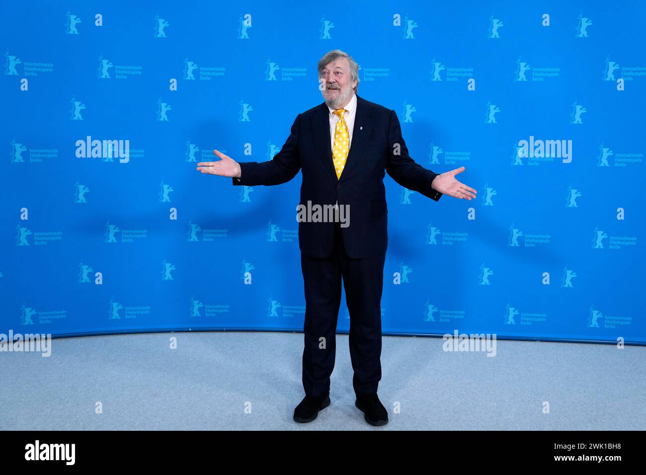 British actor and comedian Stephen Fry poses for photographers at the ...