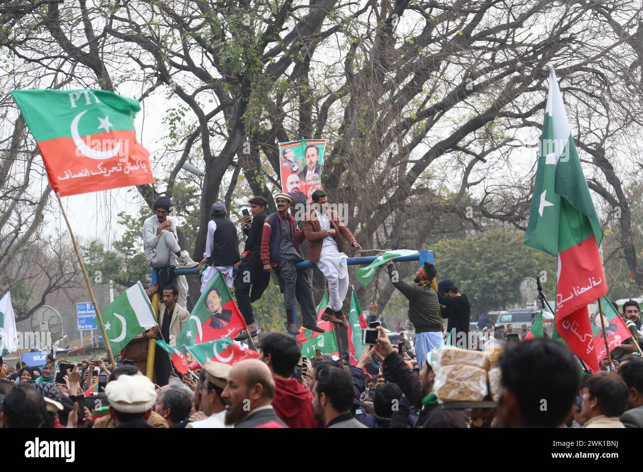 Supporters and activists of the Pakistan Tehreek-e-Insaf (PTI) party ...