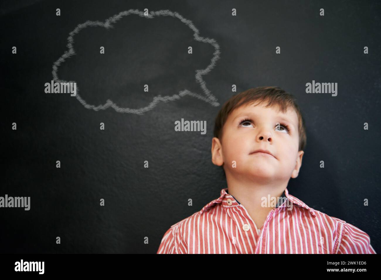 Boy, standing and blackboard of thought bubble by student as drawing in ...