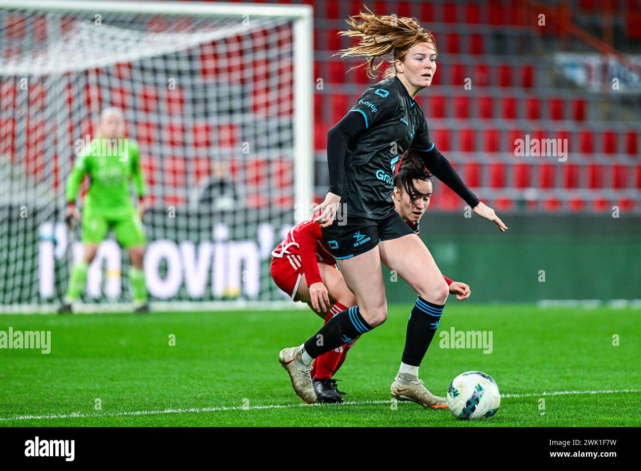 Liege, Belgium. 17th Feb, 2024. Nikee Van Dijk (20) of OHL and Loredana ...