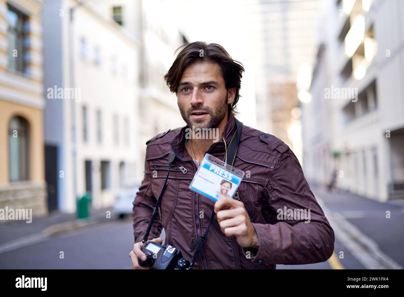 Photographer, journalist and news with man in city for running, press ...