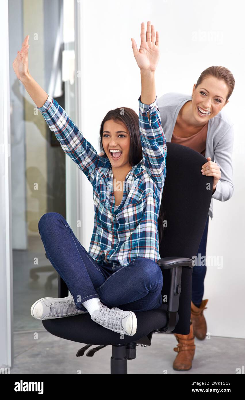 Push a chair, business people and women with smile, excited and ...