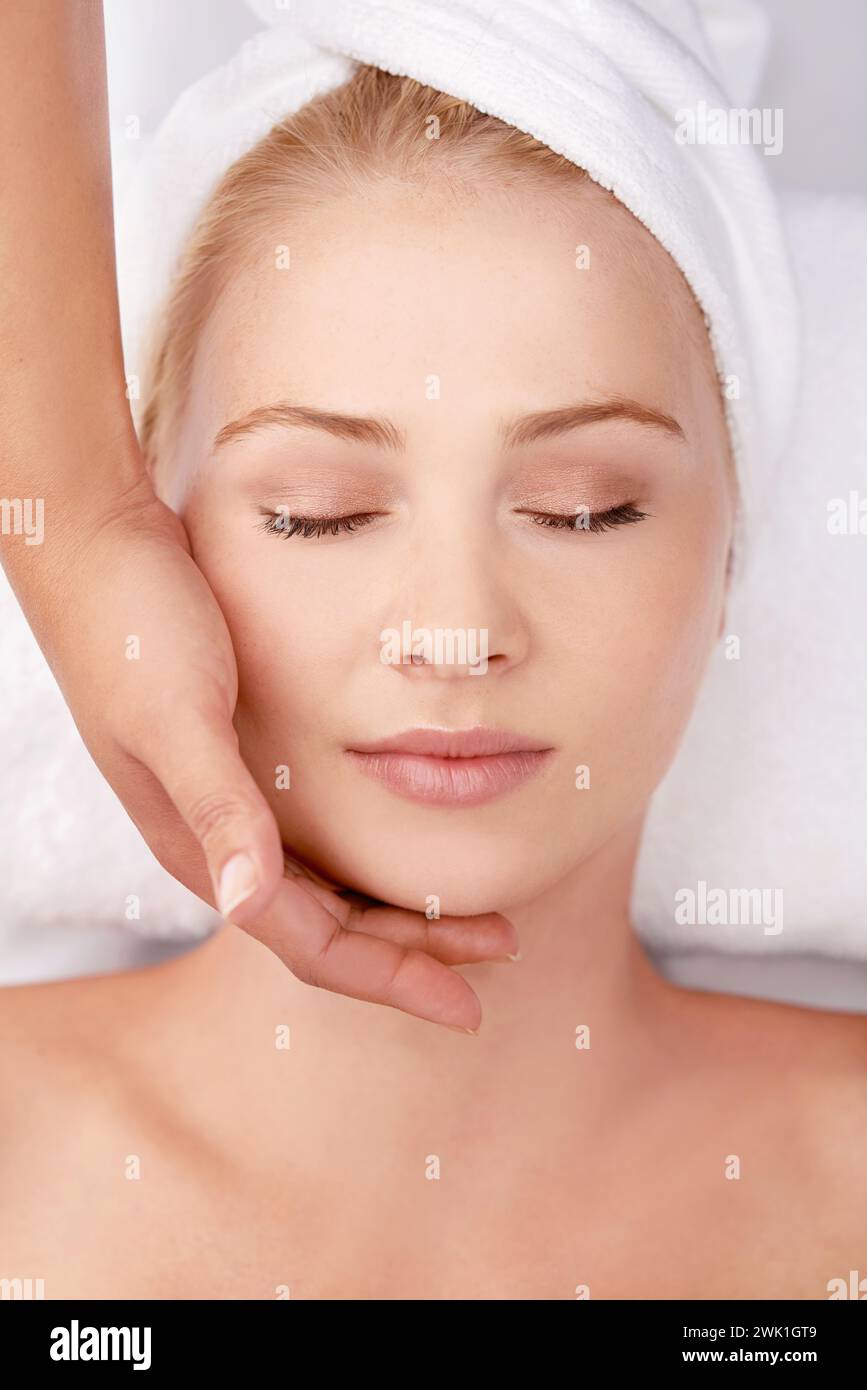 Face, massage and woman at a spa with hands of masseuse for lymphatic ...