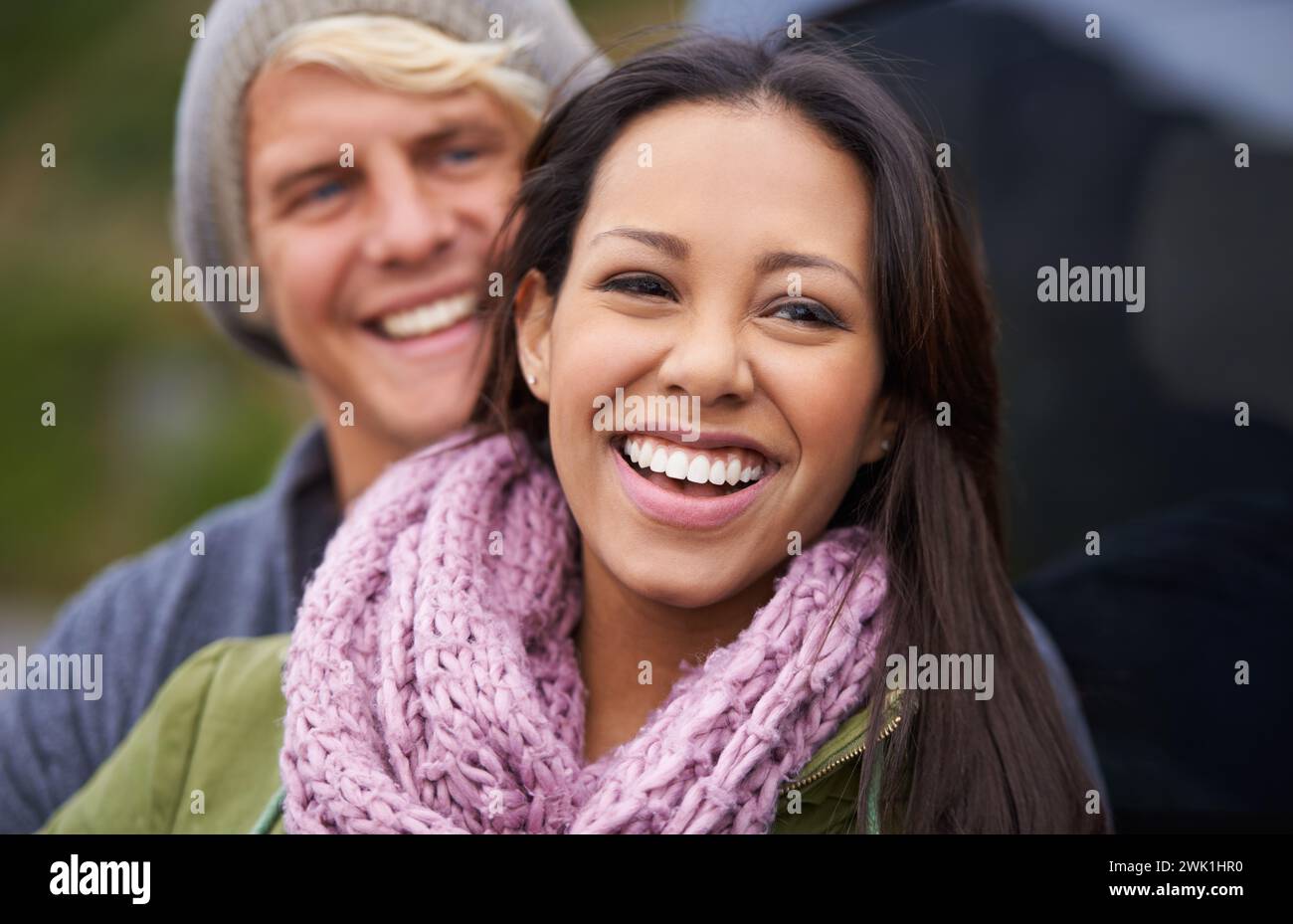 Happy, love and couple hug in nature for travel, freedom or road trip ...