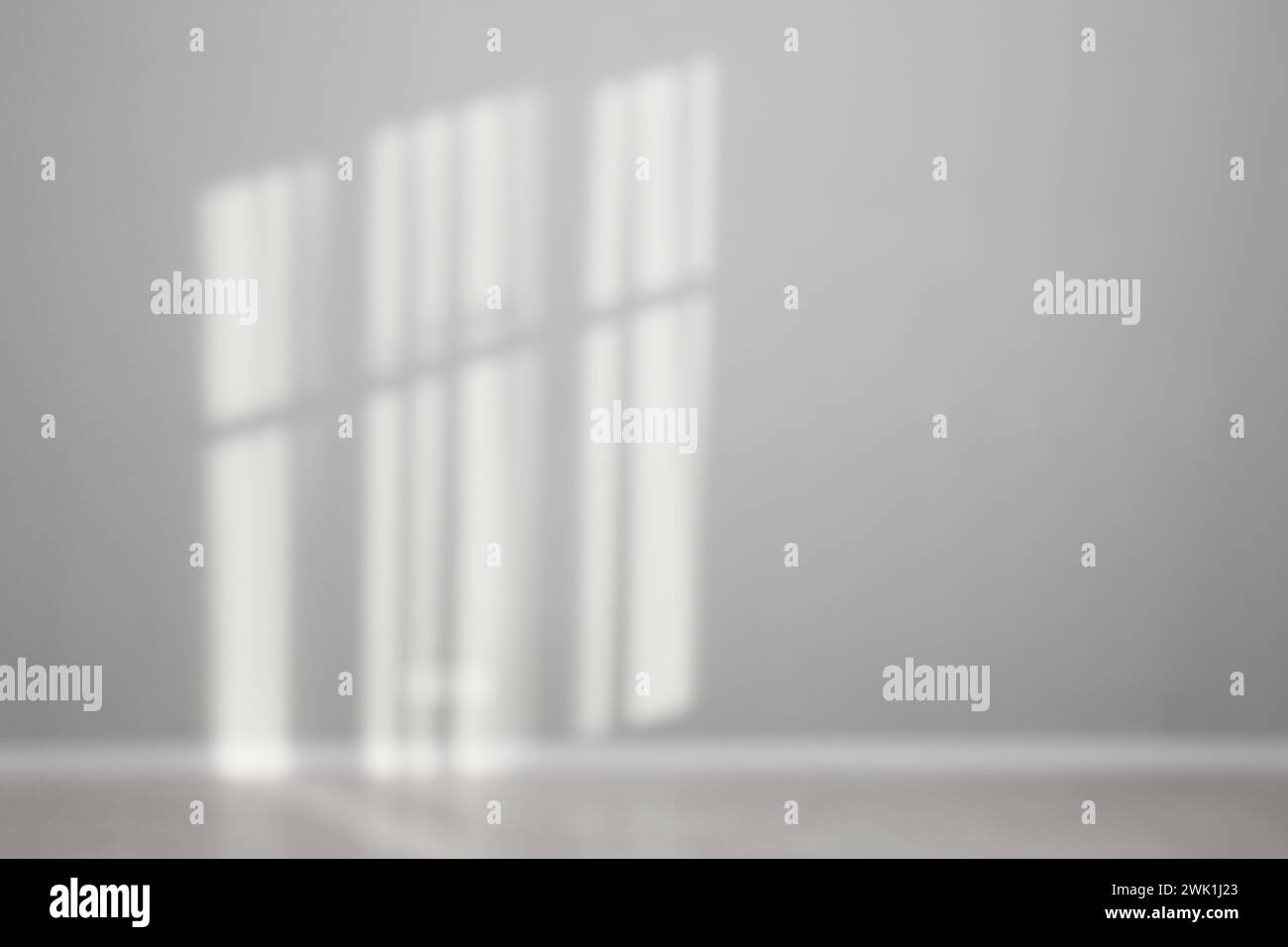 Light and shadows from window on wall indoors Stock Photo - Alamy
