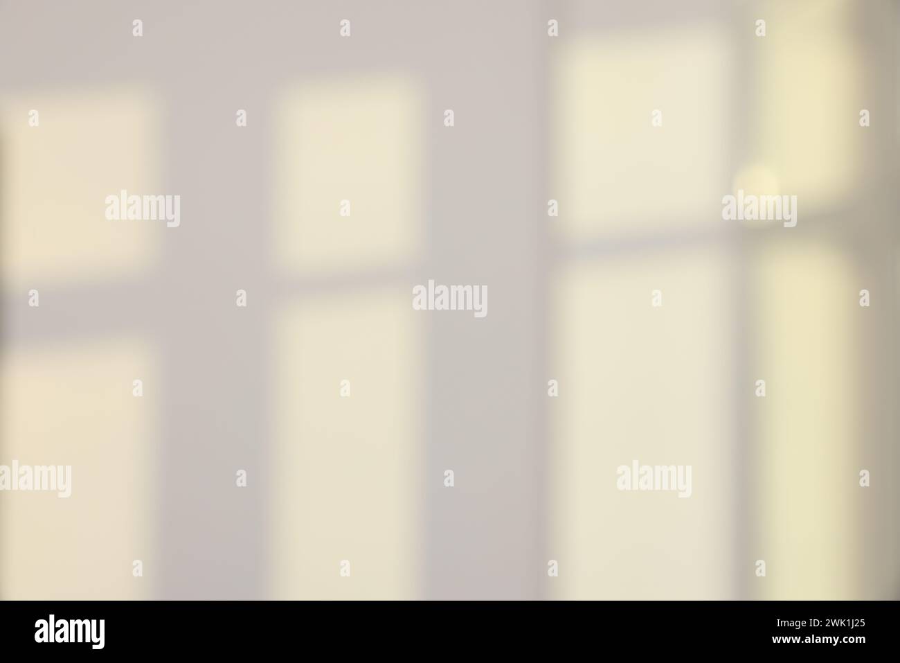 Light and shadows from window on wall indoors Stock Photo - Alamy