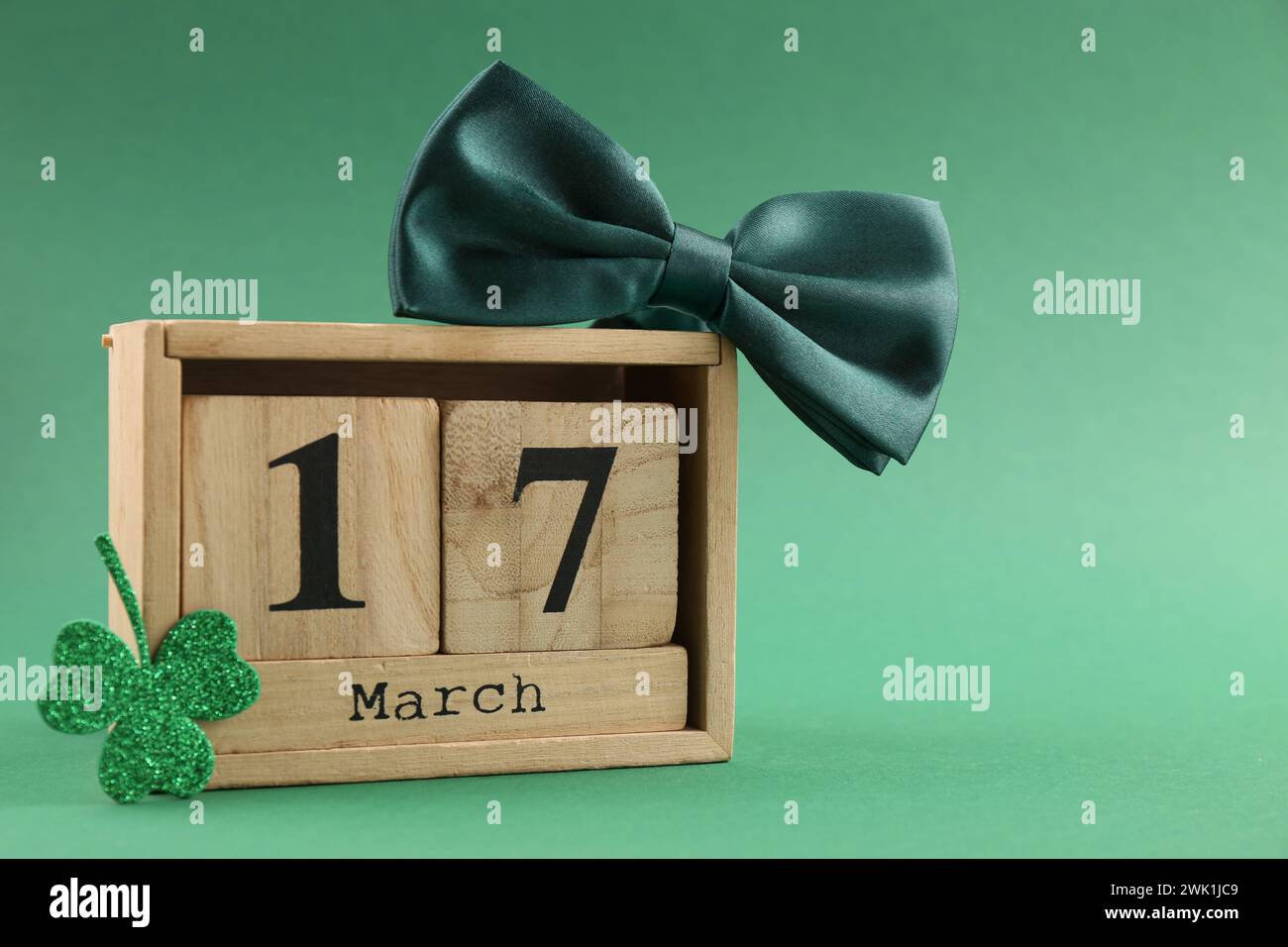 St. Patrick's day - 17th of March. Block calendar, bowtie and clover ...