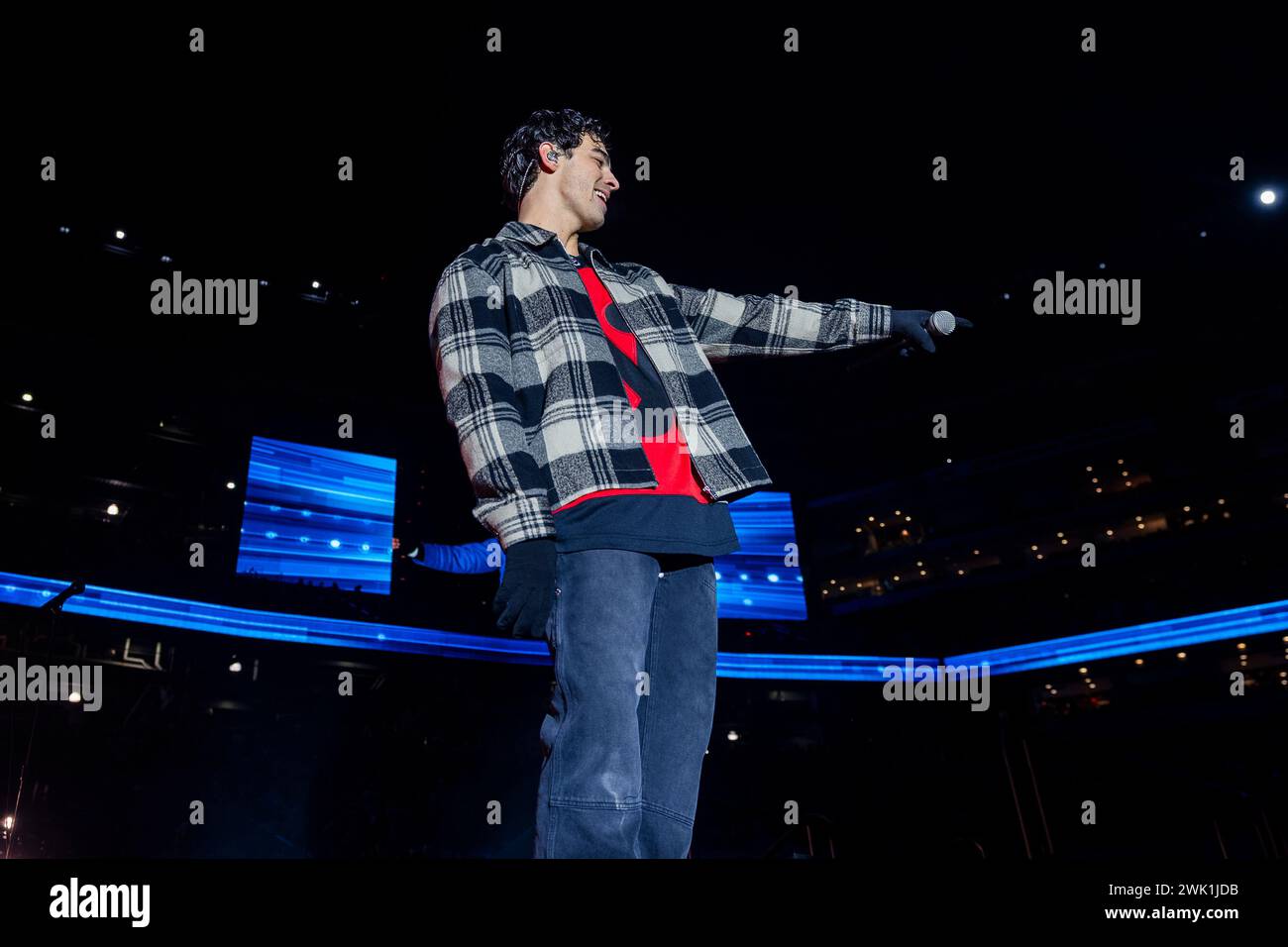 Joe Jonas performs with the Jonas Brothers before an NHL Stadium Series ...