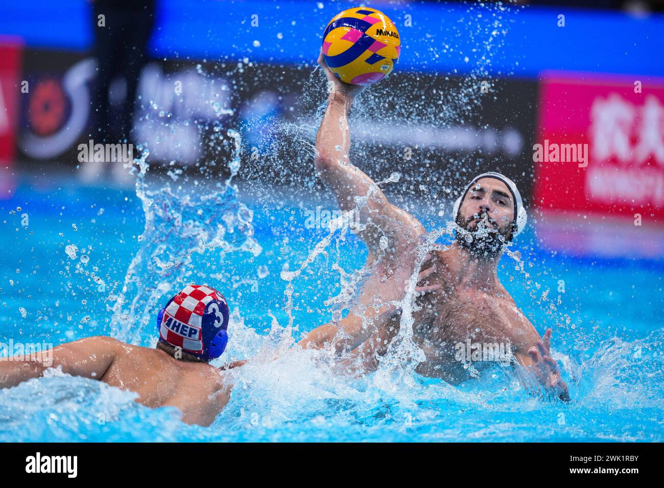 Doha, Qatar. 17th Feb, 2024. Francesco Di Fulvio (R) of Italy shoots ...