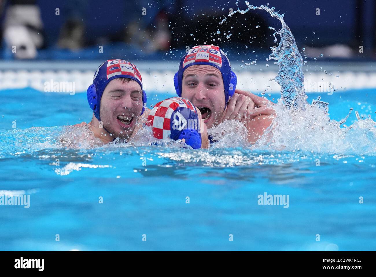 Doha, Qatar. 17th Feb, 2024. Players of Croatia celebrate after the men ...