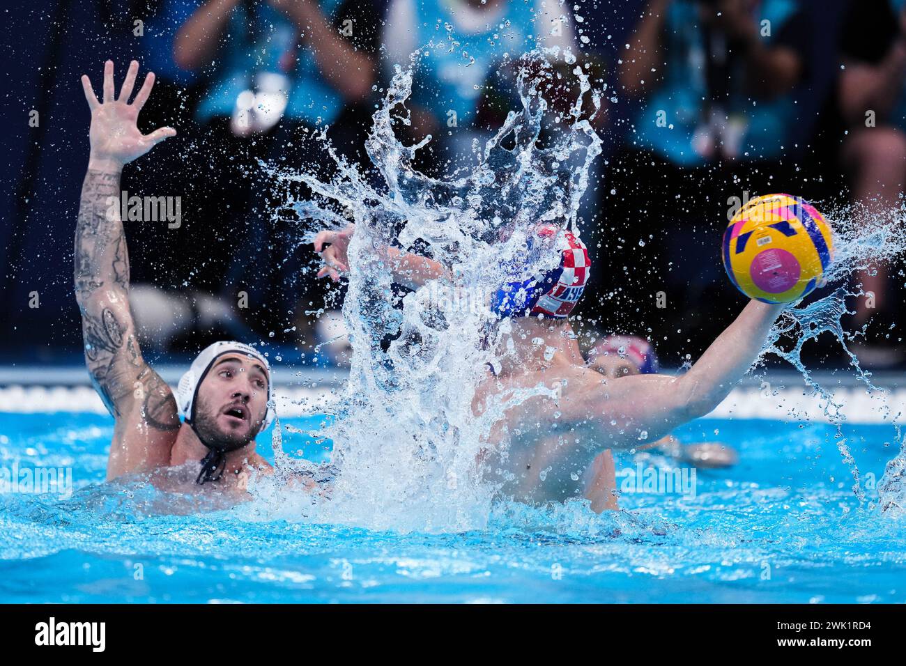 Doha, Qatar. 17th Feb, 2024. Konstantin Kharkov (R) of Croatia shoots ...