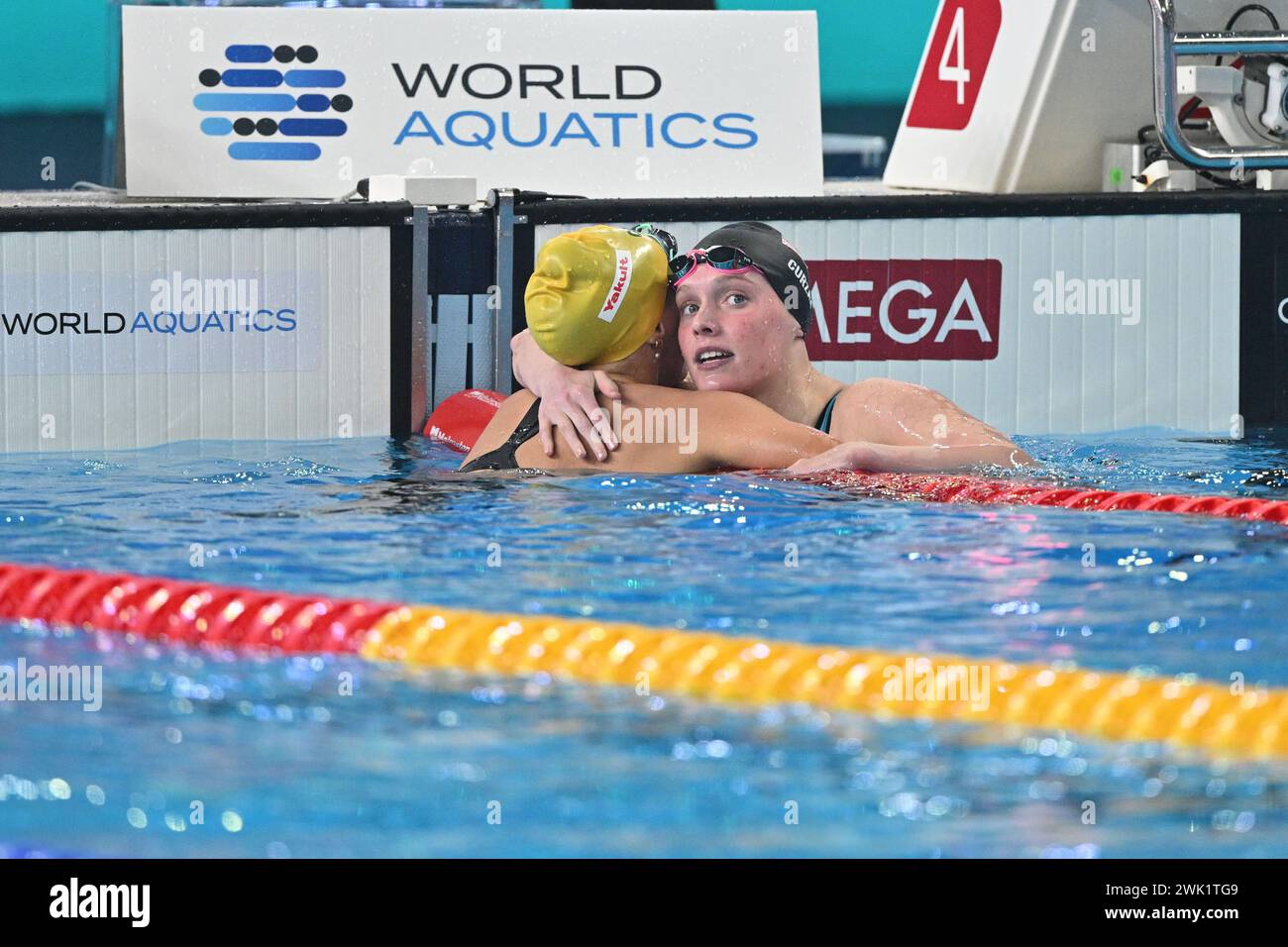 Doha, Qatar. 17th Feb, 2024. Claire Curzan (R) of the United States ...
