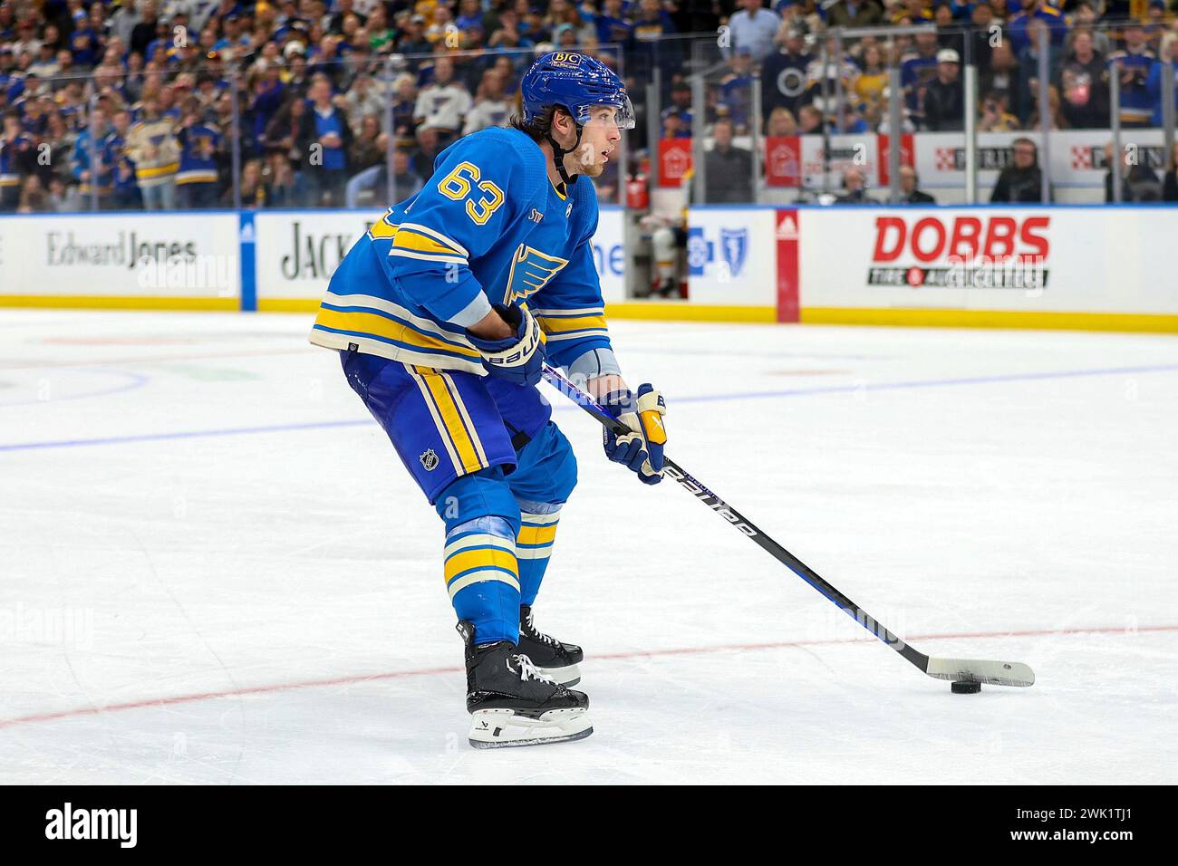 St. Louis Blues' Jake Neighbours (63) controls the puck during the ...