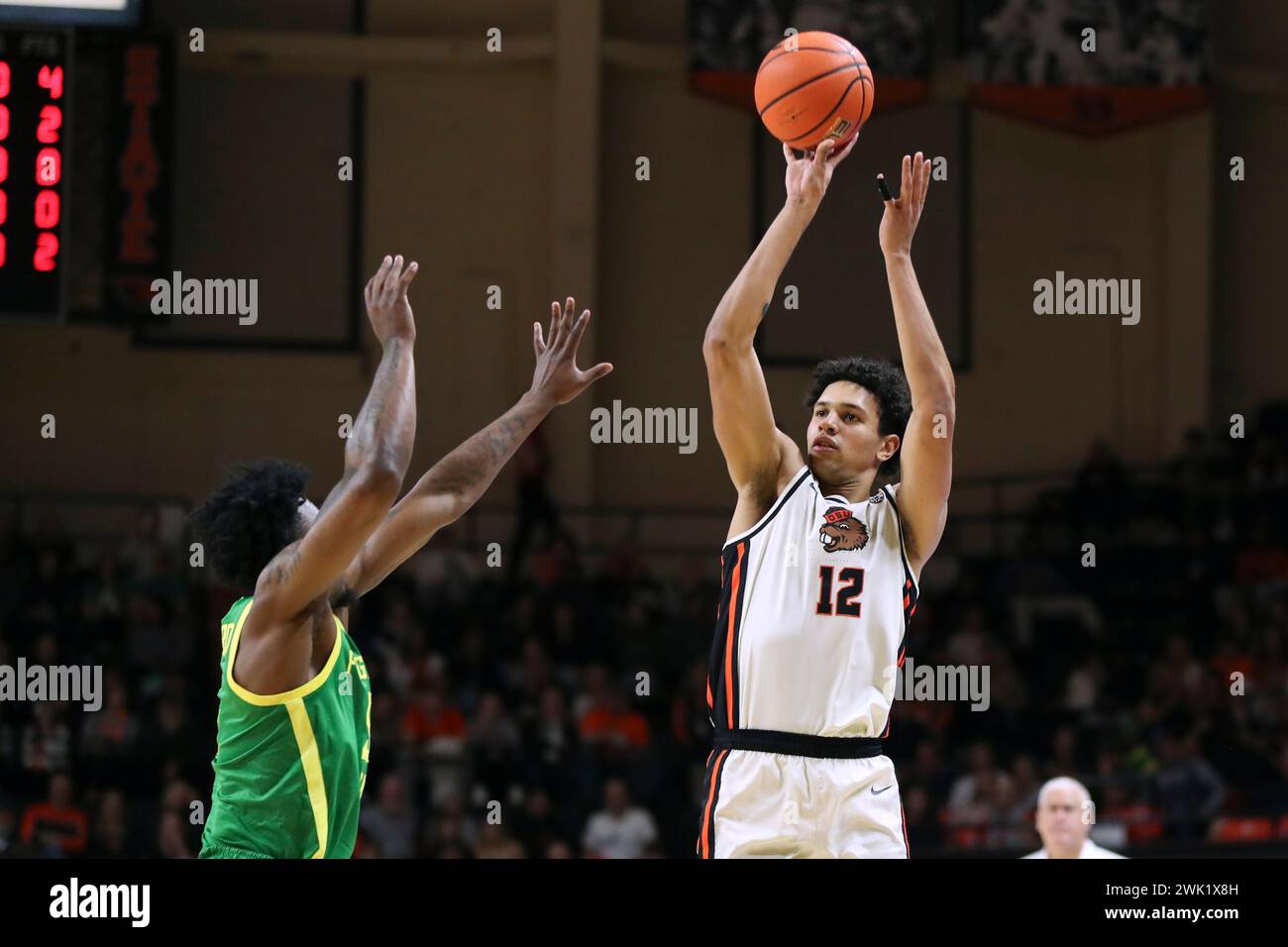 Oregon State forward Michael Rataj (12) shoots over Oregon guard ...