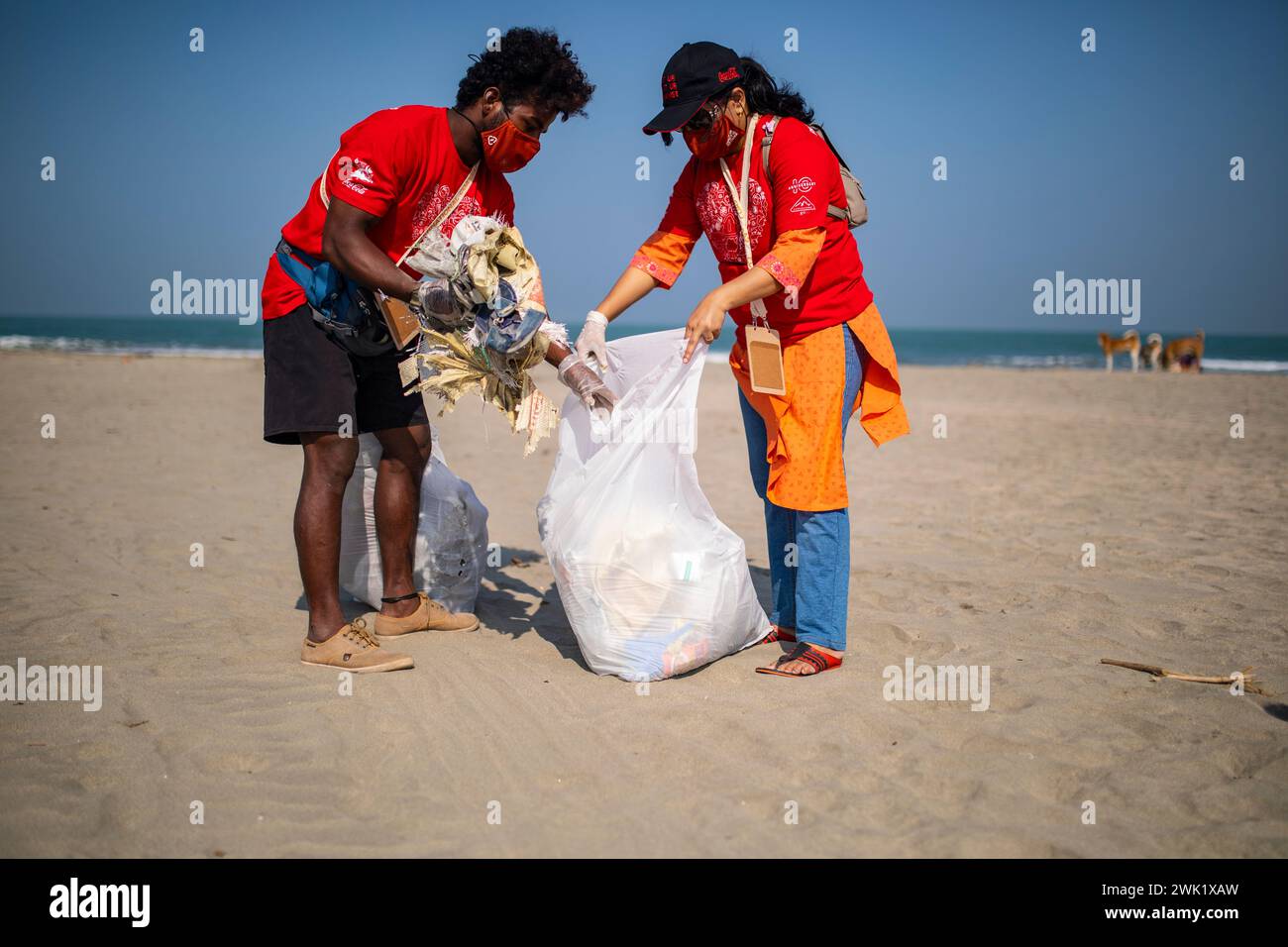 Volunteers clean up the Saint Martin's Island sea beach as a pert of ...