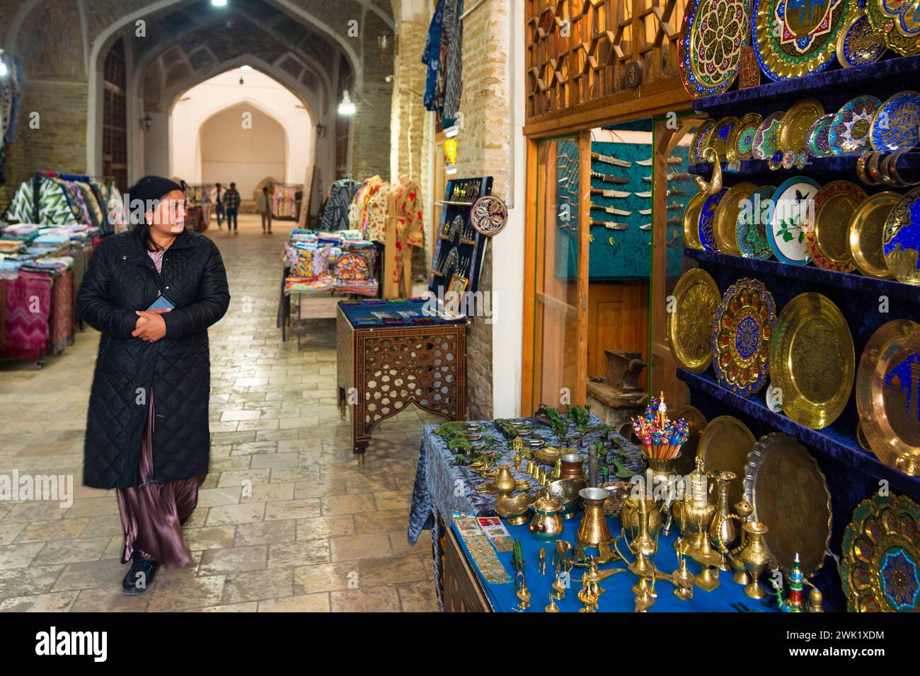 A lady goes window-shopping in the centuries-old Toki Zagaron market ...