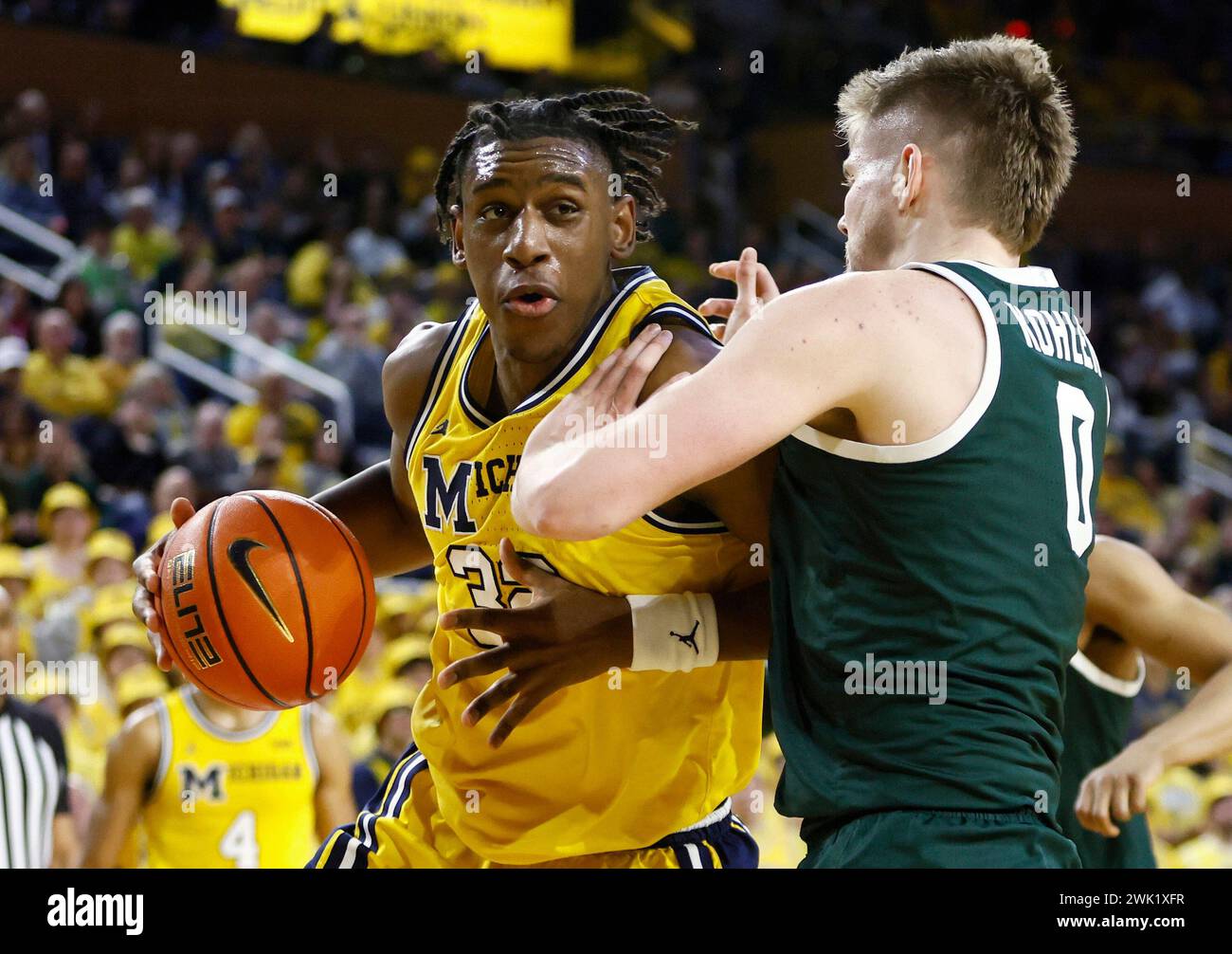Michigan forward Tarris Reed Jr. (32) drives against Michigan State ...