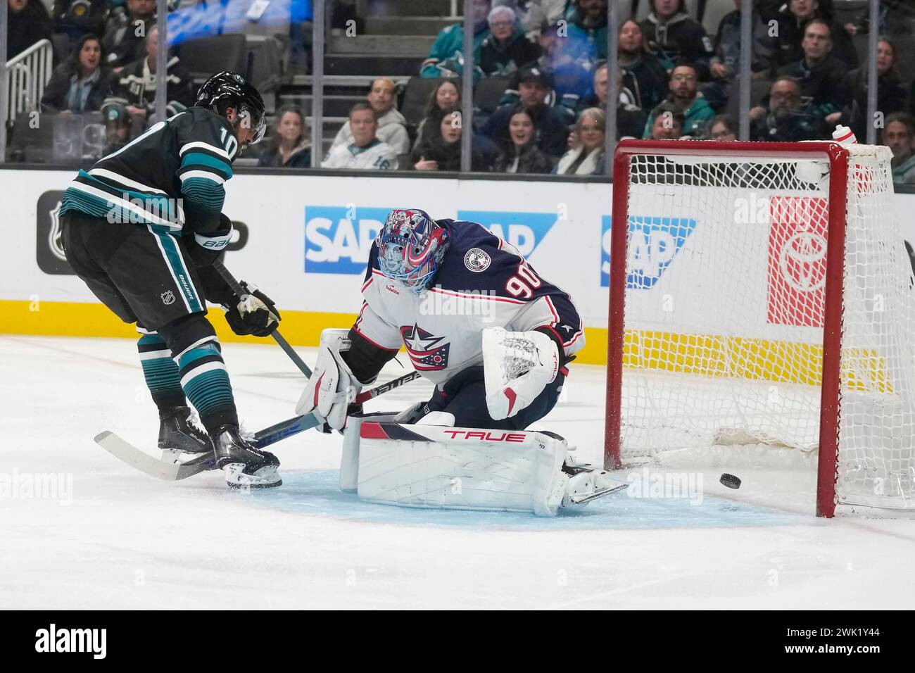 San Jose Sharks left wing Anthony Duclair, left, scores a goal past ...