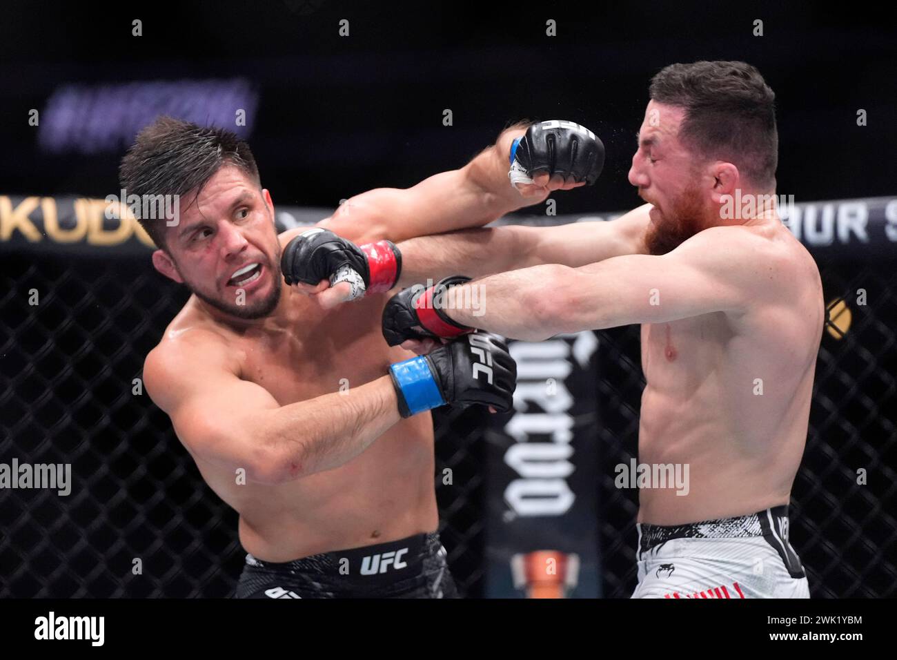 Merab Dvalishvili, right, connects with Henry Cejudo during their ...