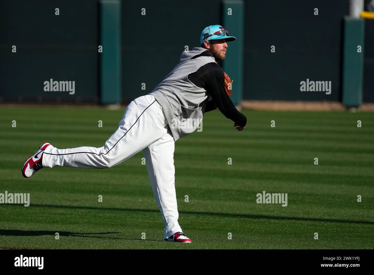 Arizona Diamondbacks starting pitcher Merrill Kelly warms up during ...